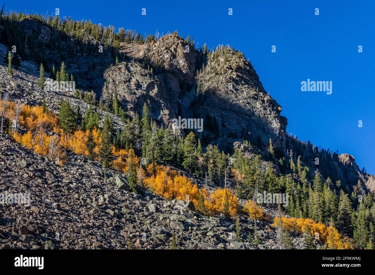 Mountains rise dramatically above the Rock Creek Valley in the ...
