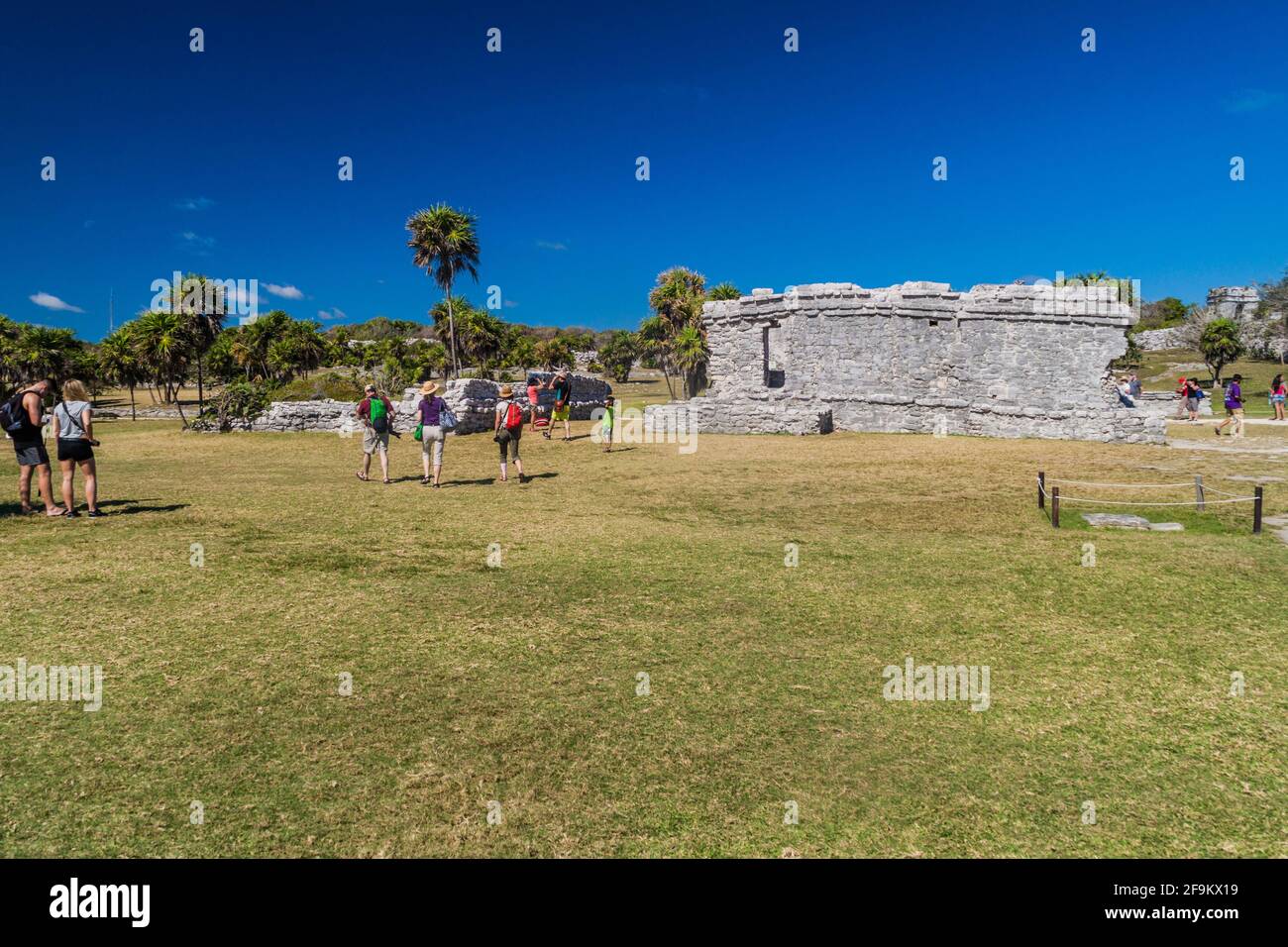 TULUM, MEXIO - FEB 29, 2016: Tourists visit the ruins of the ancient ...