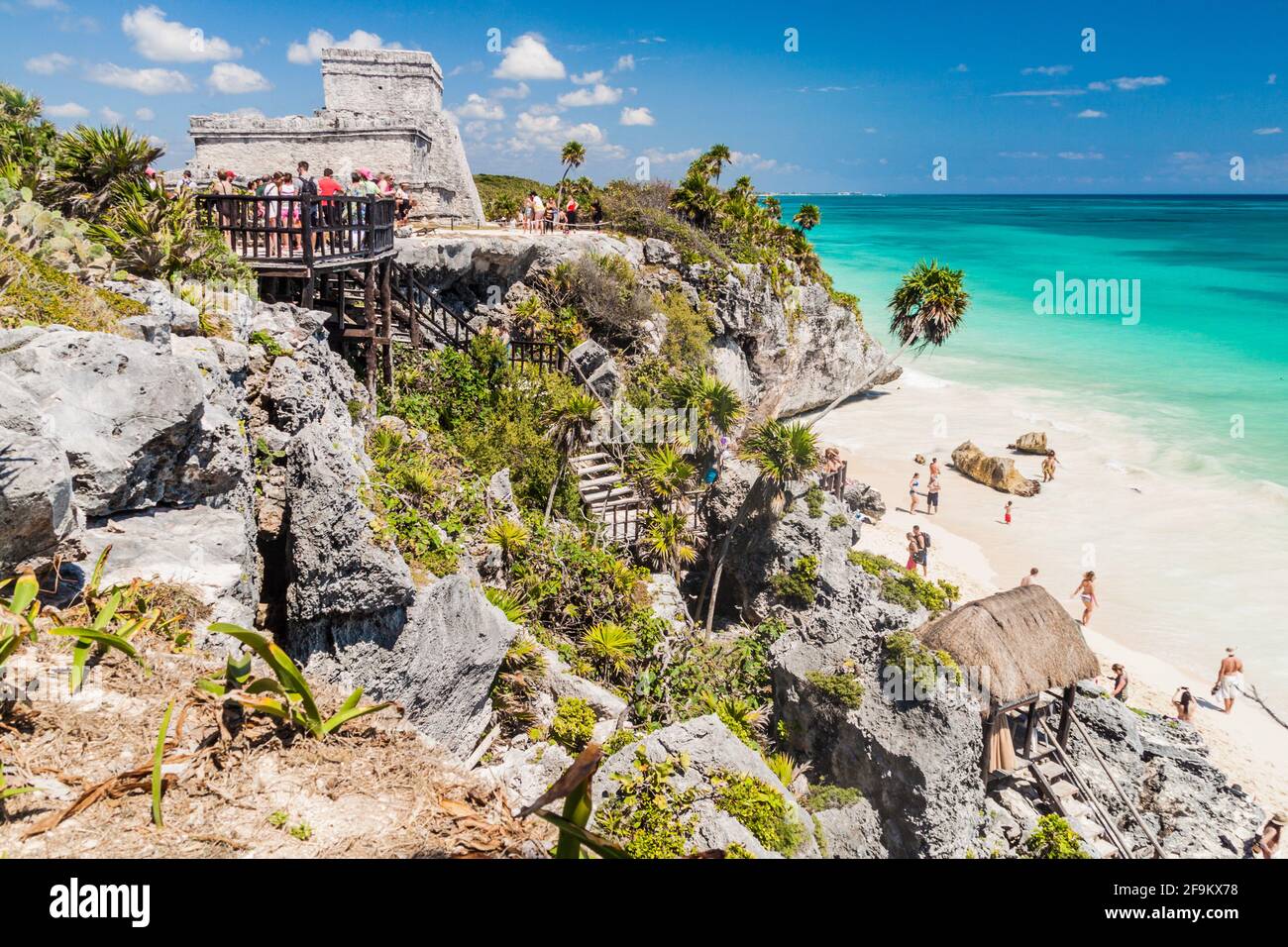TULUM, MEXIO - FEB 29, 2016: Tourists at the beach under the ruins of ...