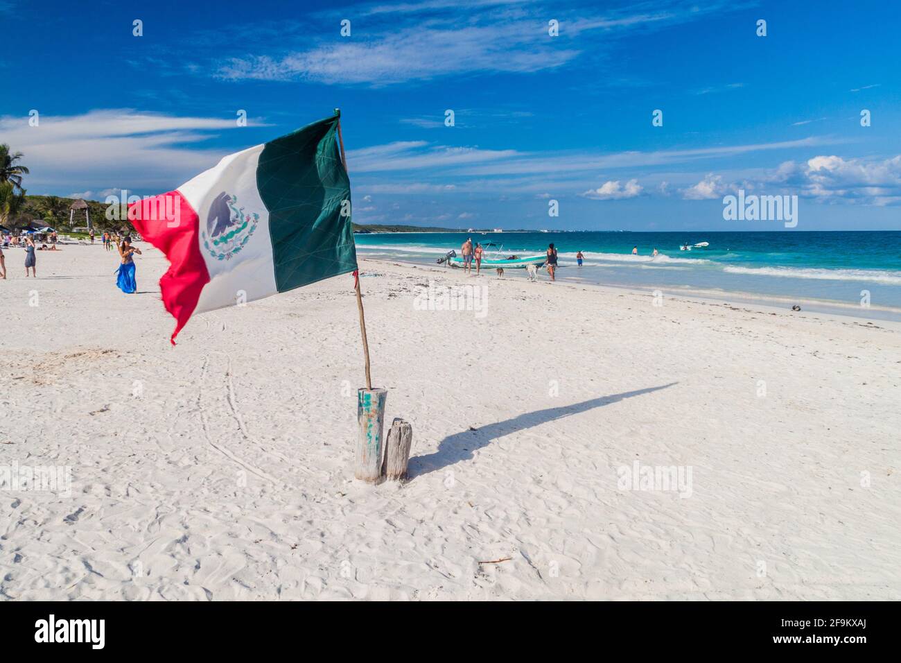 TULUM, MEXIO - FEB 29, 2016: Mexican flag at the Caribbean beach in ...