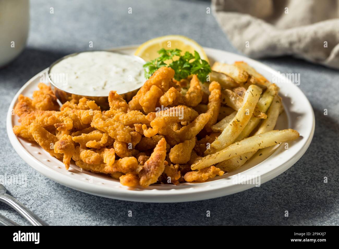 Homemade Fried Clam Strips with Fries and Tartar Sauce Stock Photo - Alamy