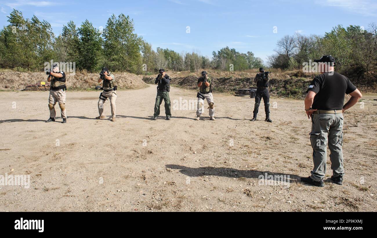 Military army soldiers in action tactical combat shooting from rifle ...
