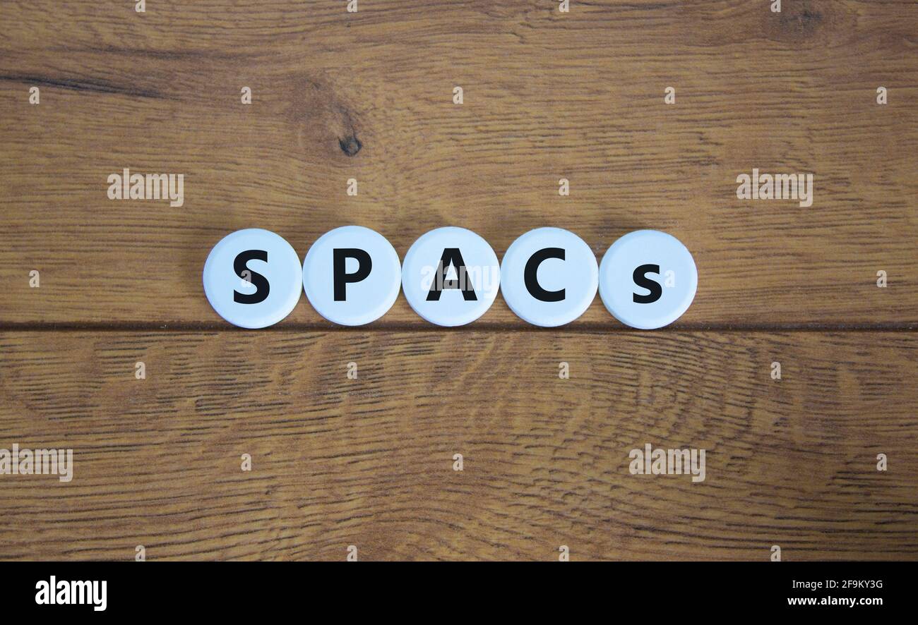 SPACs symbol. White circles with words 'SPACs, special purpose ...