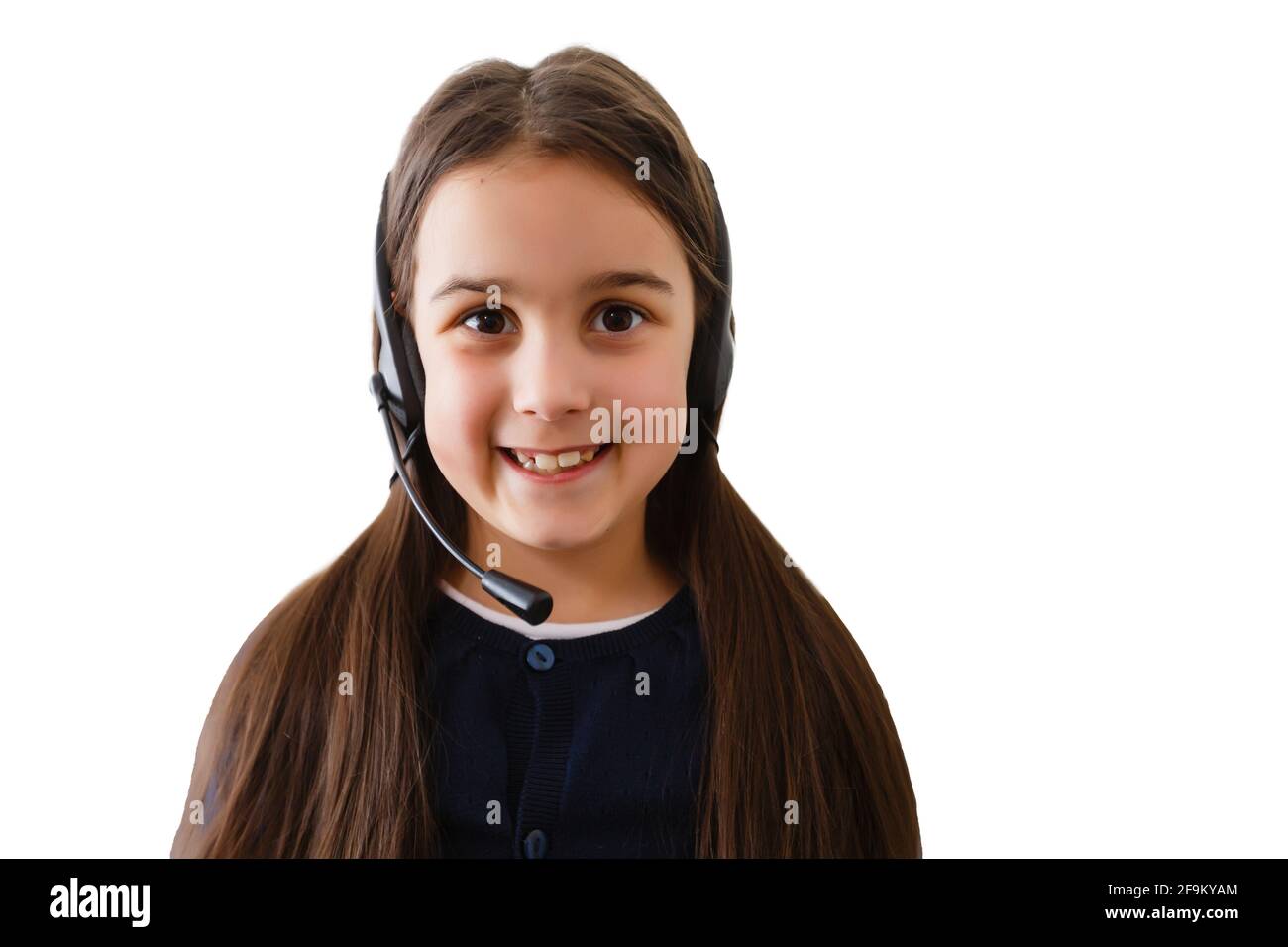 Portrait of child with headset. White background Stock Photo - Alamy