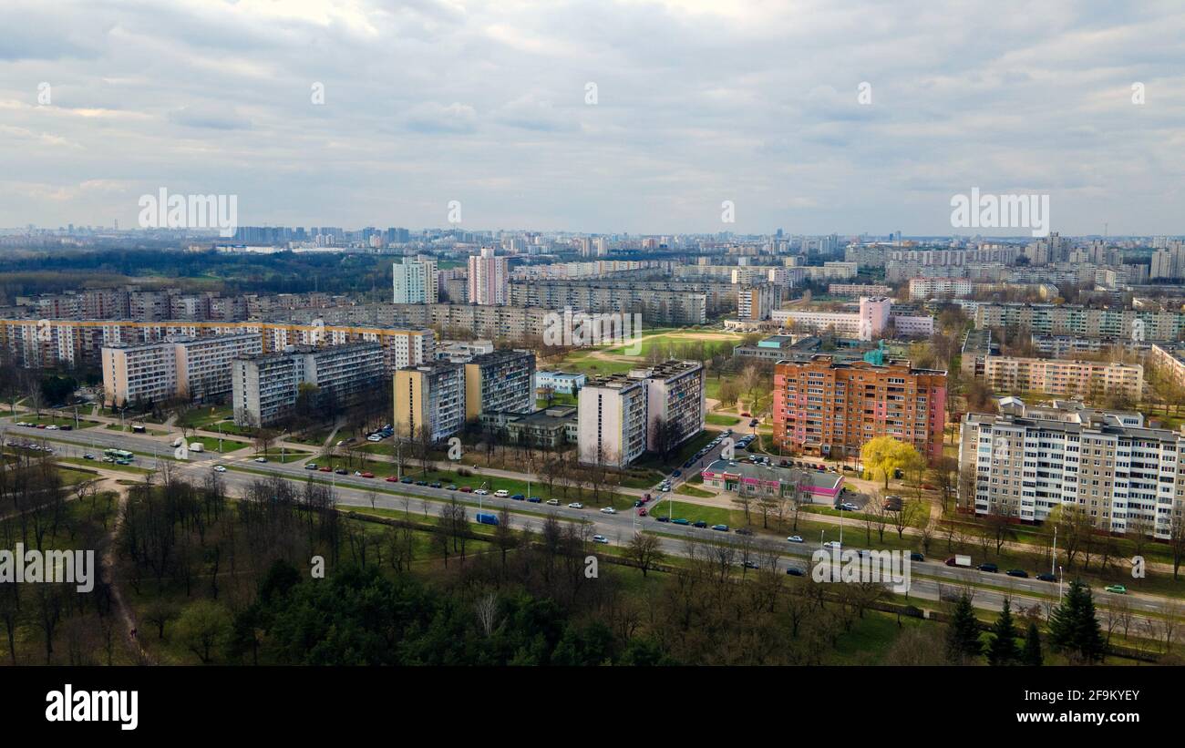 Aerial photography of the spring city park. Park alleys and a reservoir ...