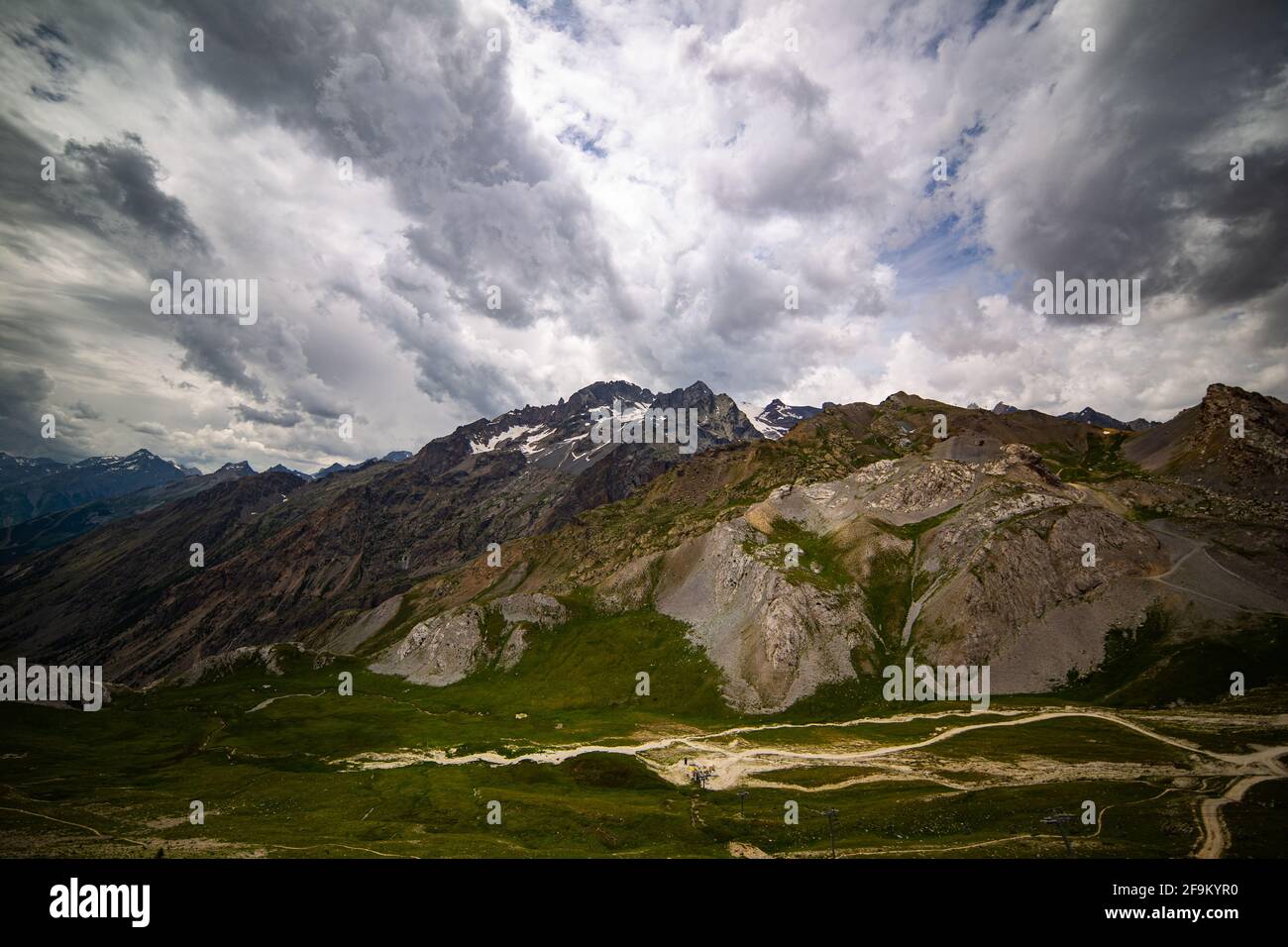 Rain clouds and rain over the mountain peaks Stock Photo - Alamy