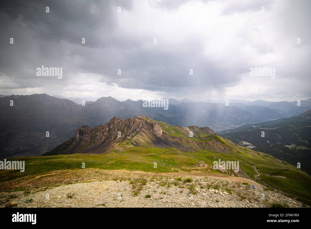 Rain clouds and rain over the mountain peaks Stock Photo - Alamy