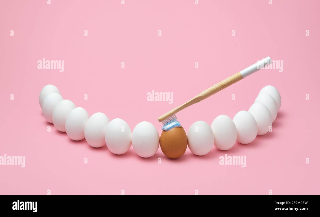 Concept for oral hygiene with a wooden toothbrush, toothpaste, and ...