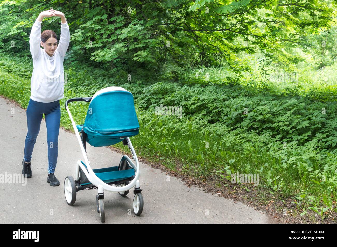 Baby in pram hi-res stock photography and images - Alamy