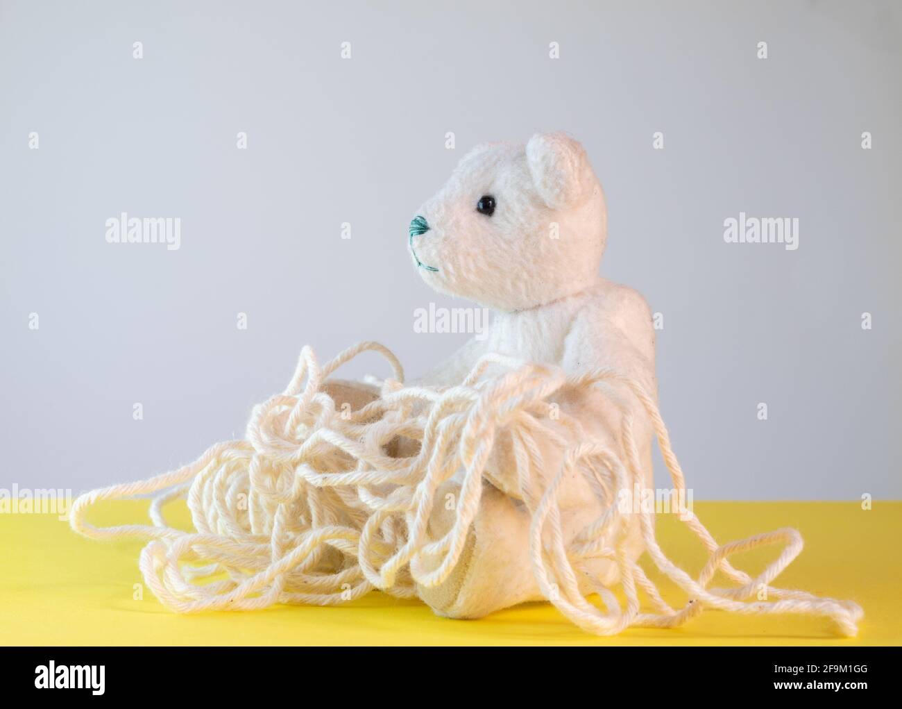 teddy bear with tangled string Stock Photo - Alamy
