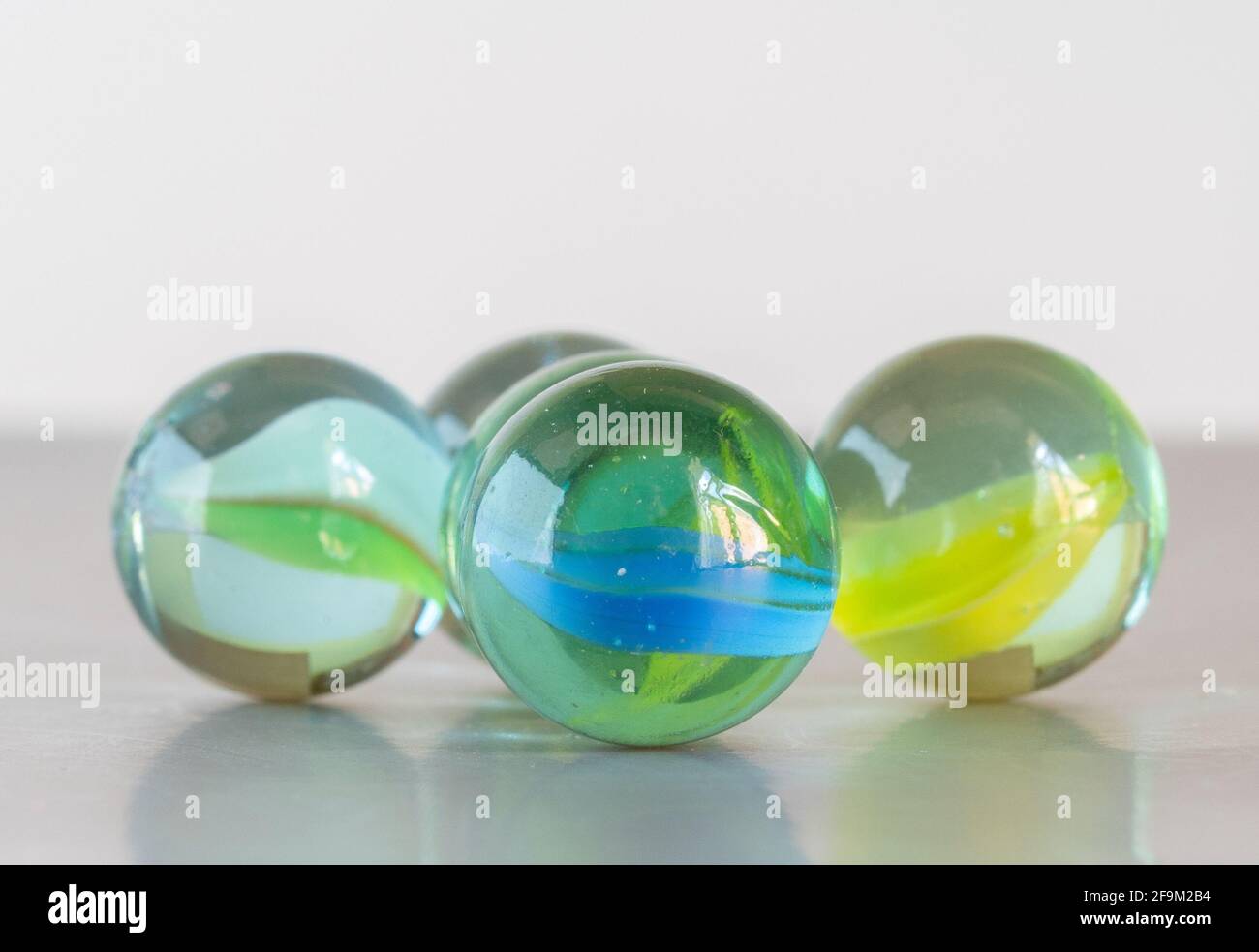 Marbles on table hi-res stock photography and images - Alamy