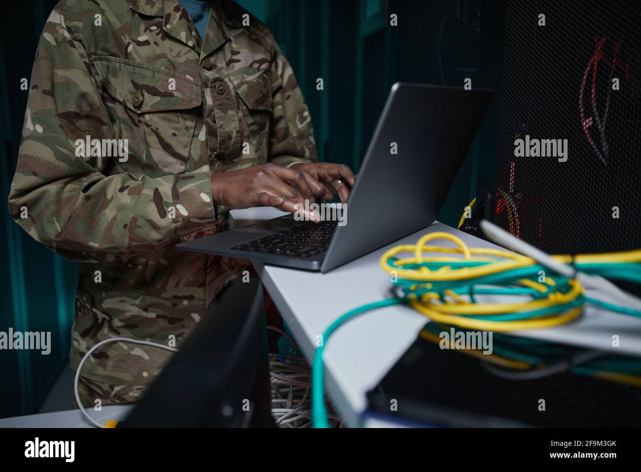 Cropped shot of unrecognizable African-American woman wearing military ...