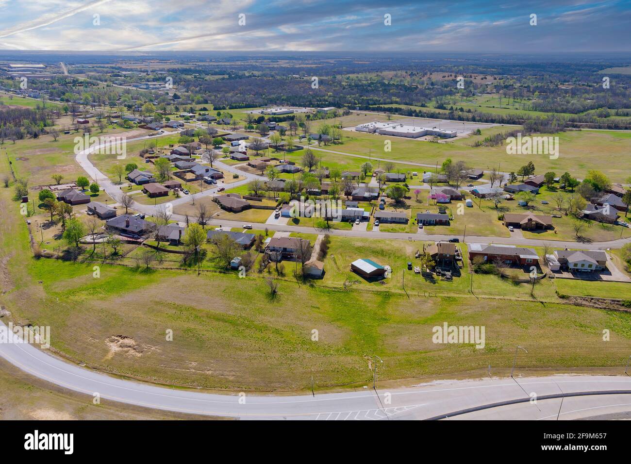 Panorama aerial view of small town near road highway located in central ...