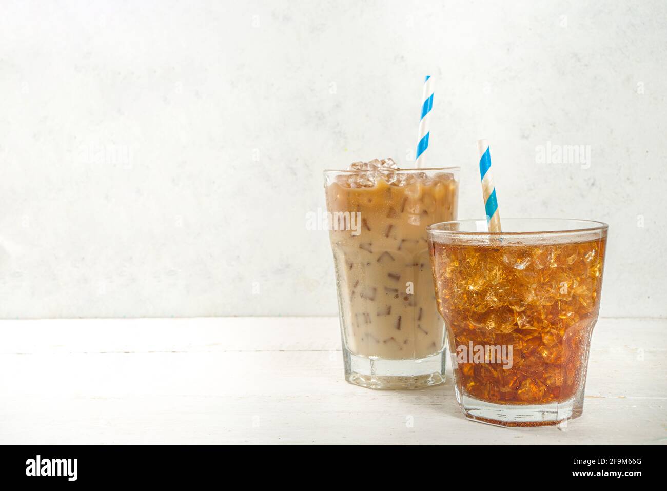 Set with different iced summer coffee drinks - espresso, frappe, latte ...