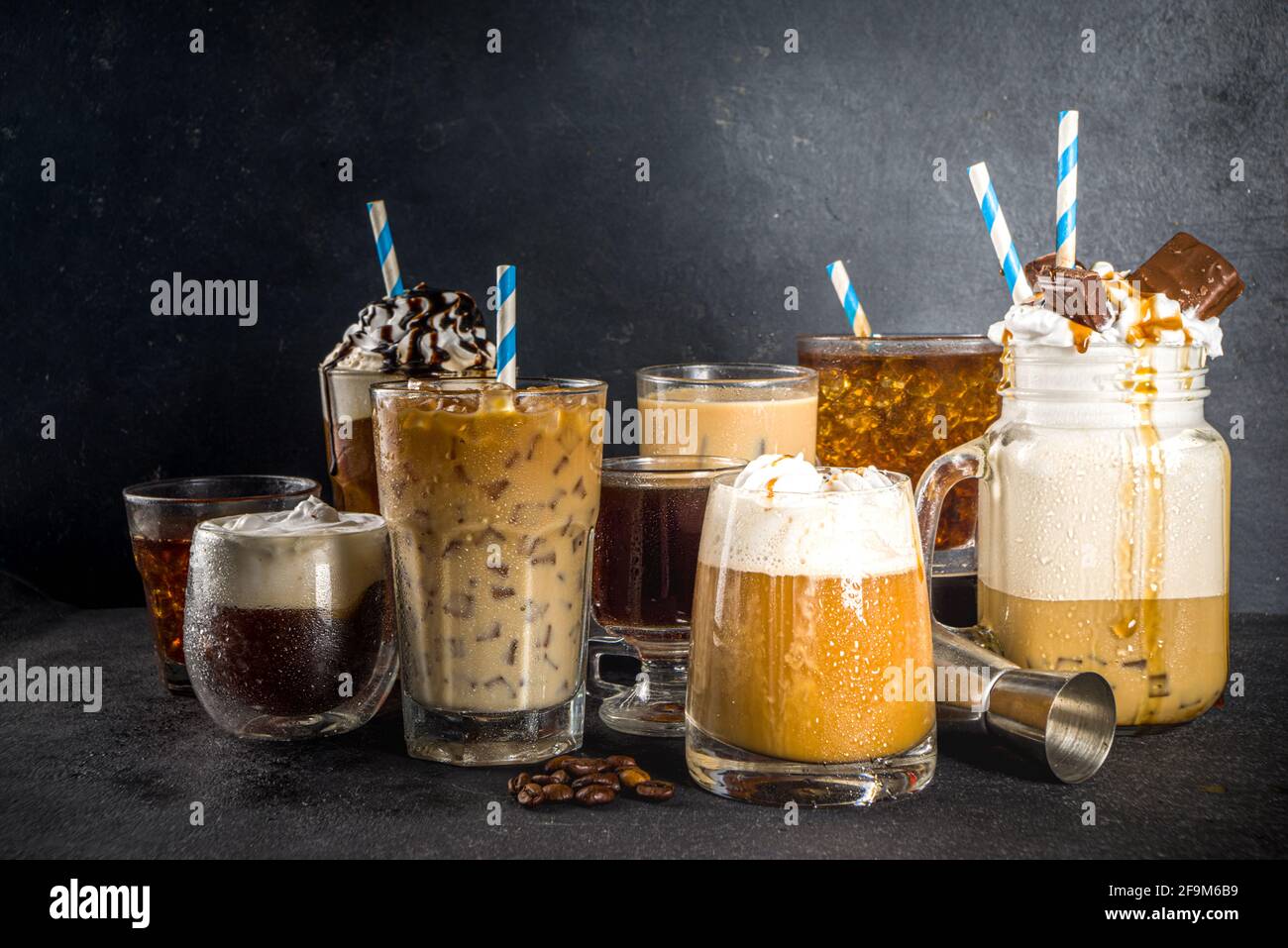 Set with different iced summer coffee drinks - espresso, frappe, latte ...
