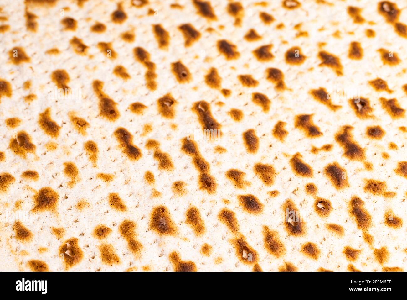 background texture matzah, unleavened bread. Matzo top view Stock Photo ...