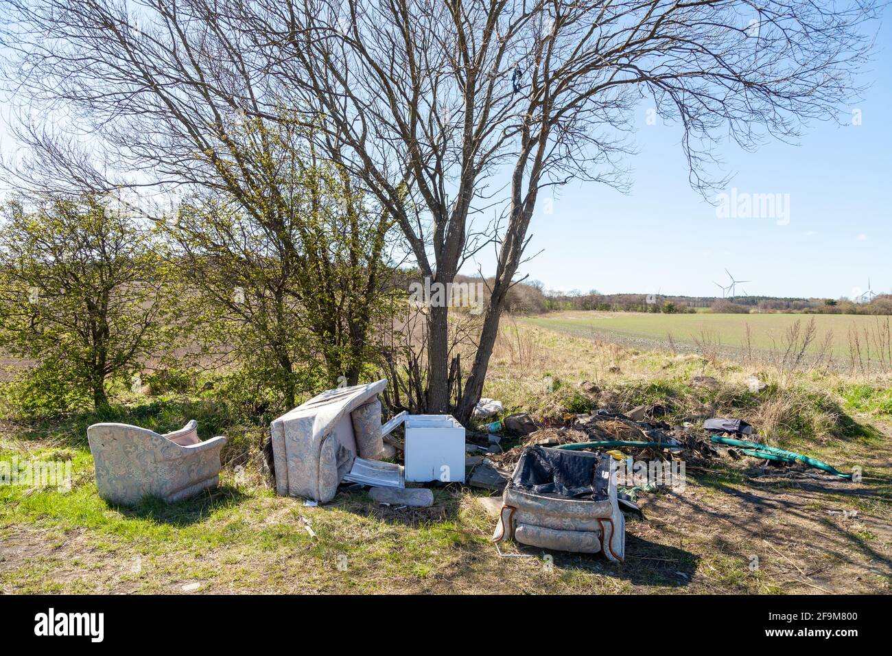 Chair dumped rubbish trash hi-res stock photography and images - Alamy