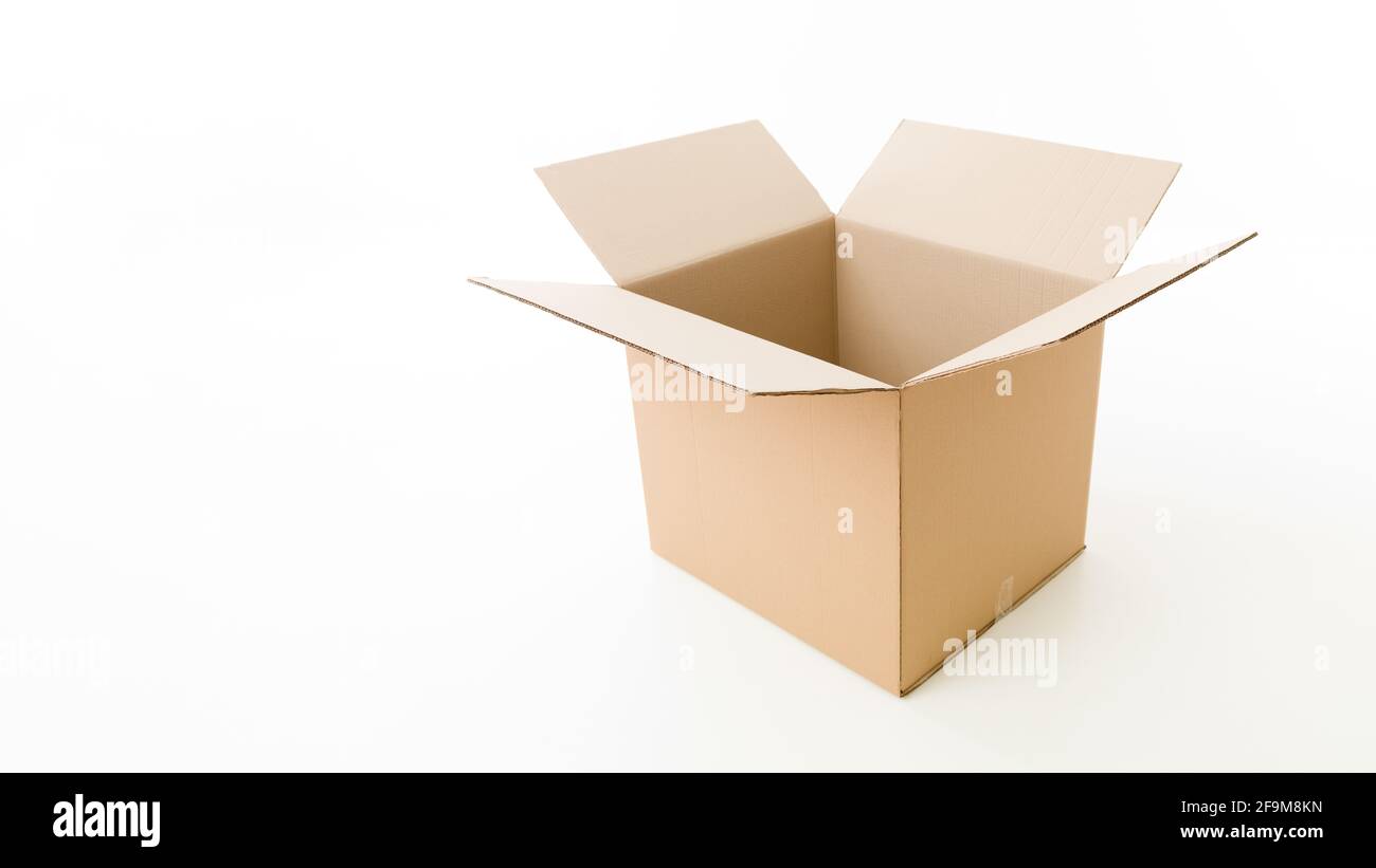 opened cardboard box on white background Stock Photo - Alamy