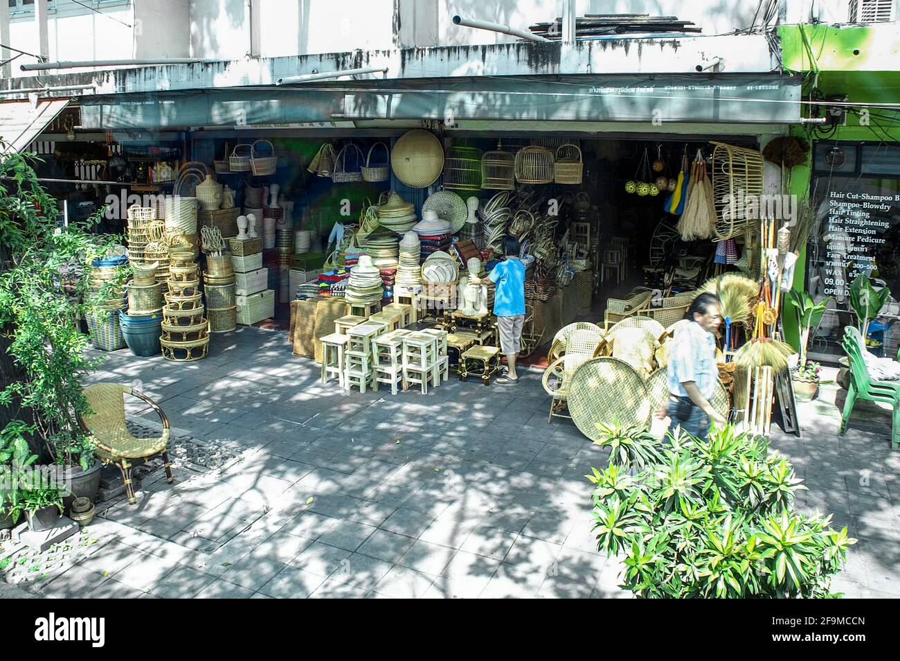 Straw goods vendor selling from a shop. Bangkok, Thailand NMR Stock ...
