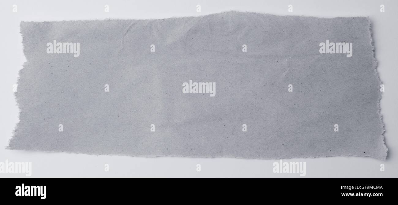 One piece of torn paper Stock Photo - Alamy