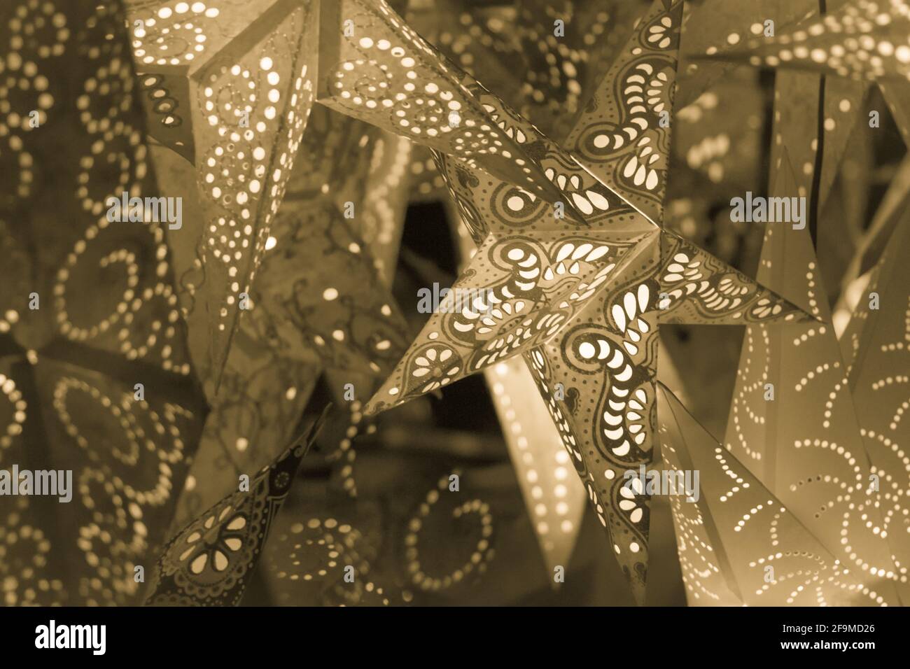 Colorful yellow xmas lantern stars at christmas market season ...
