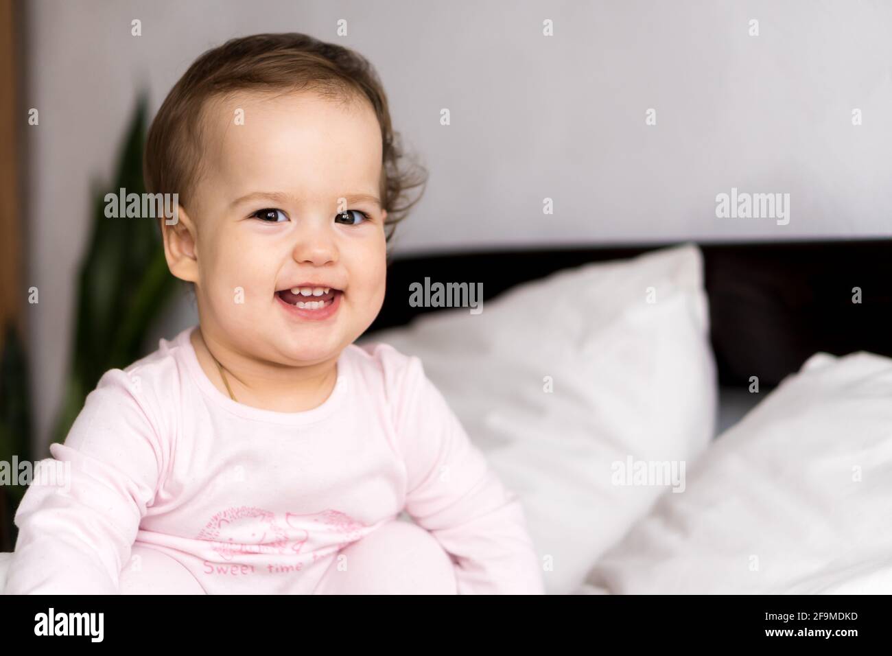 Authentic portrait caucasian little infant chubby baby girl or boy in ...