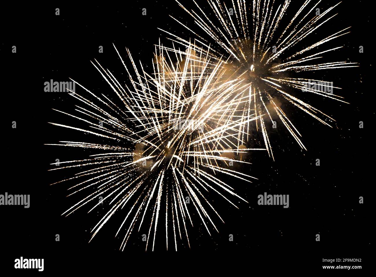 Luxury fireworks event sky show with golden big bang stars. Premium ...