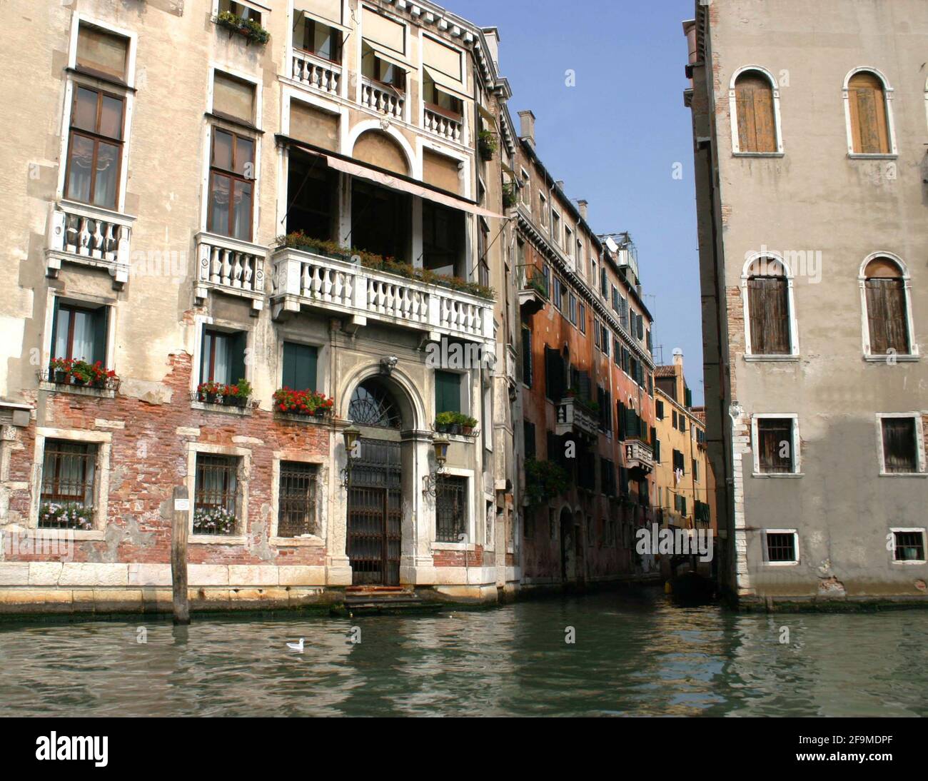 Original centuries-old buildings along the Grand Canal in Venice, Italy ...