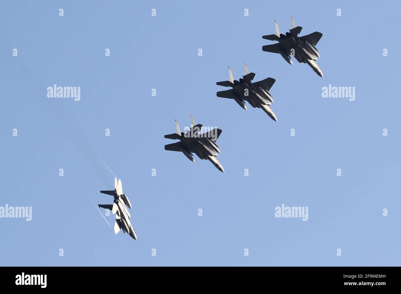 Four ship of F-15C's from the 493rd Fighter Squadron on the break ...