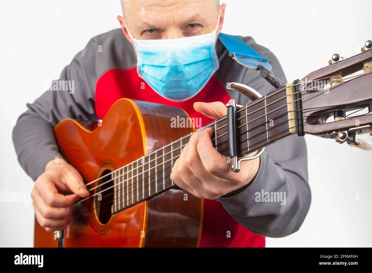 Masked guitar player hi-res stock photography and images - Alamy