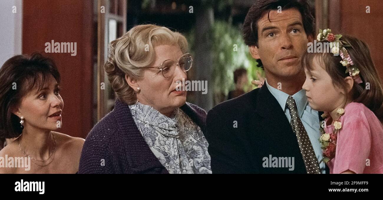 USA. Mara Wilson , Sally Field , Pierce Brosnan and Robin Williams in a scene from (C)20th ...