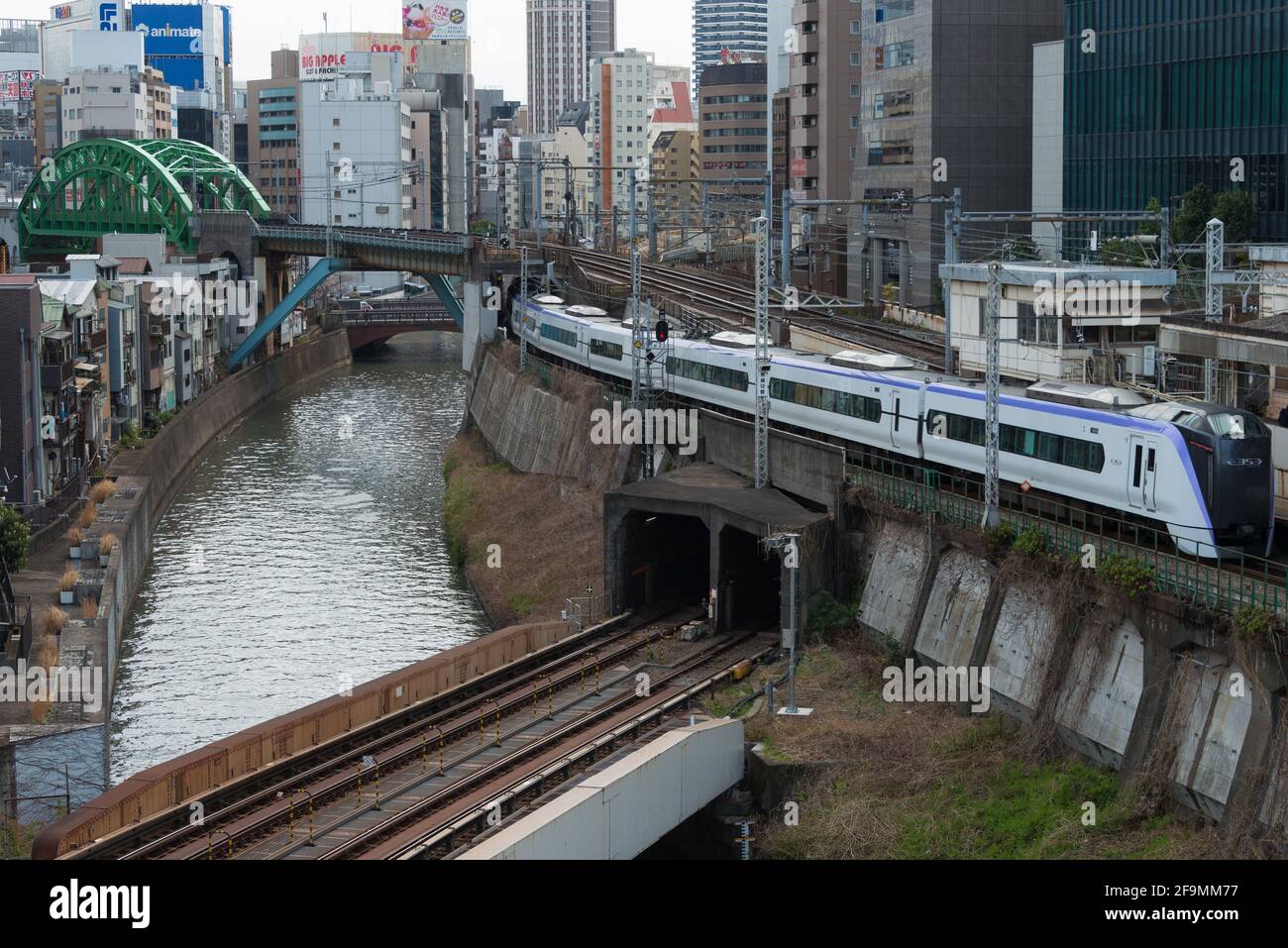 Tokyo, Japan - JR East E353 series at Kanda River view from Ochanomizu ...