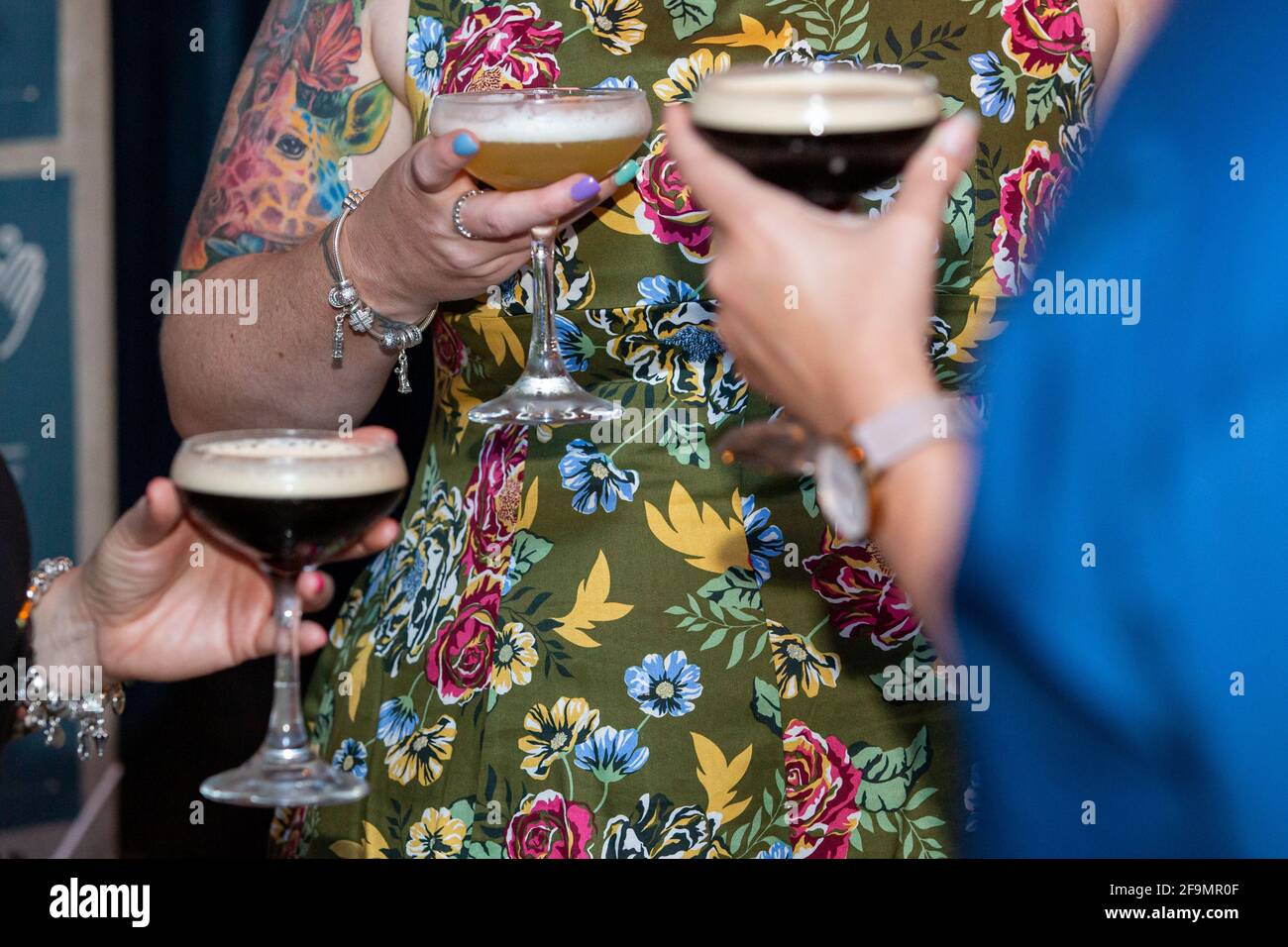 People socialising over cocktails Stock Photo - Alamy