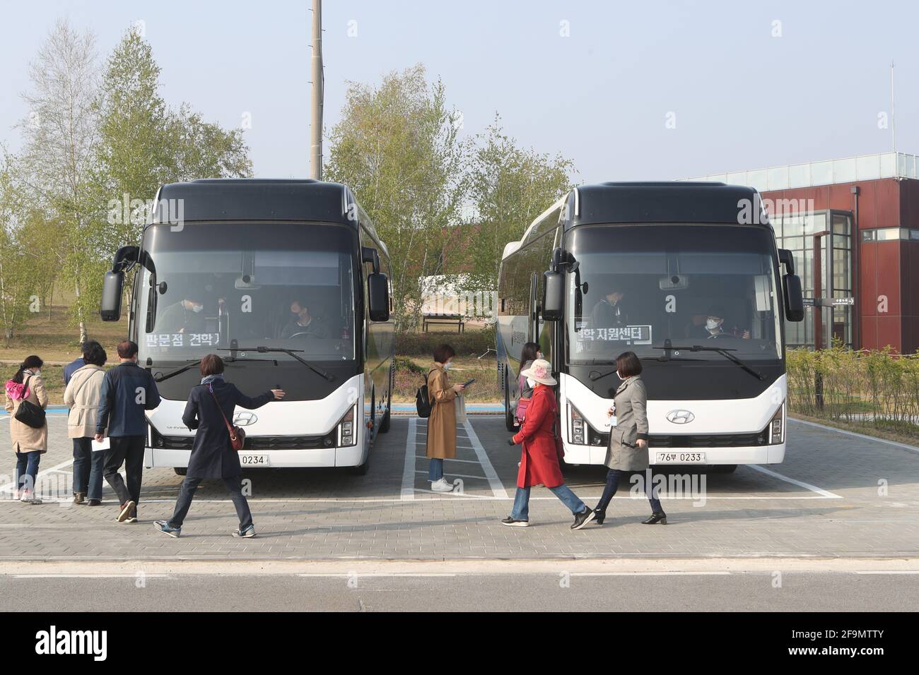 20th Apr, 2021. Panmunjom tour reopens Tourists board buses at Imjingak ...