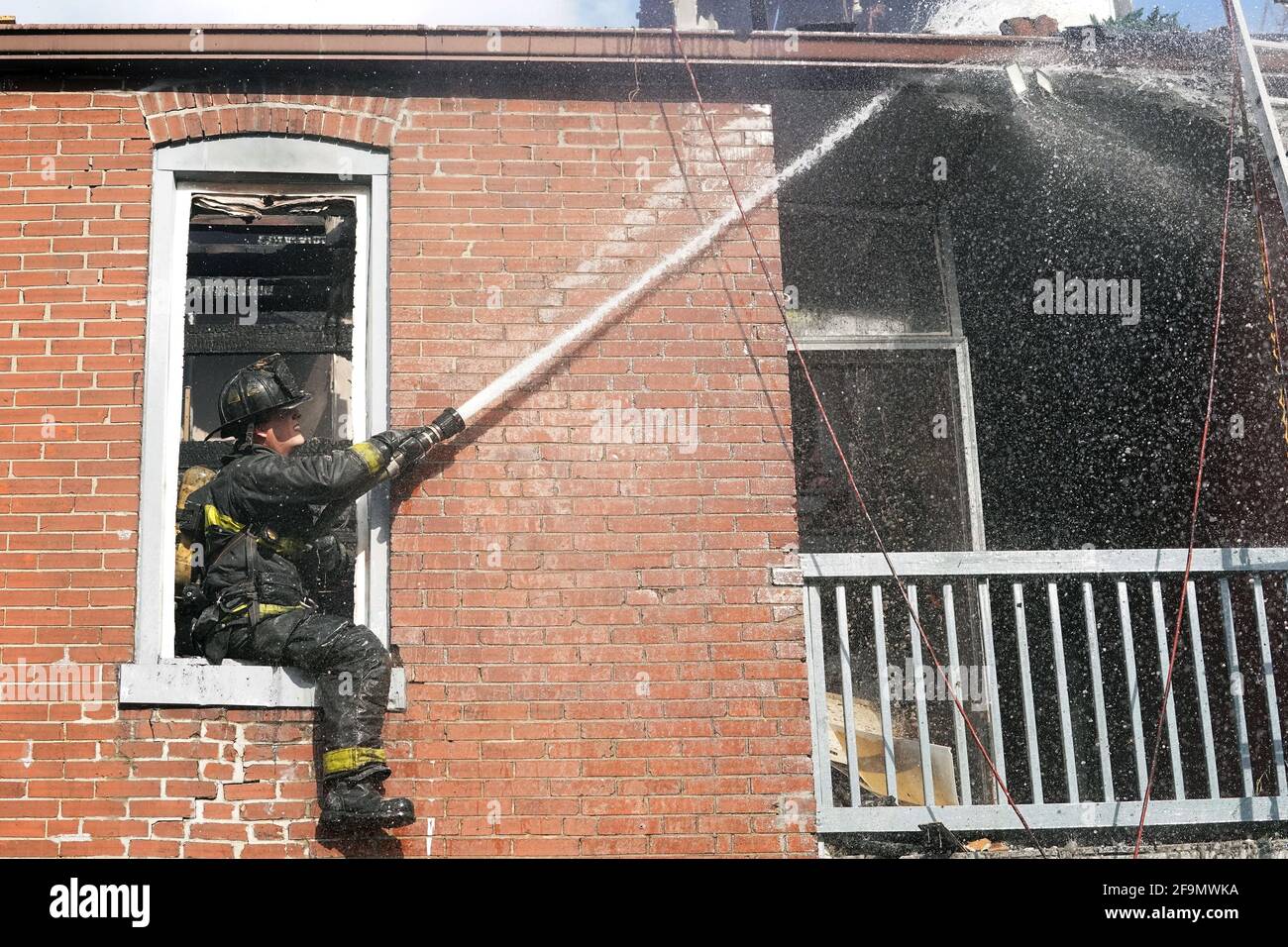 St. Louis, United States. 19th Apr, 2021. A St. Louis firefighter ...
