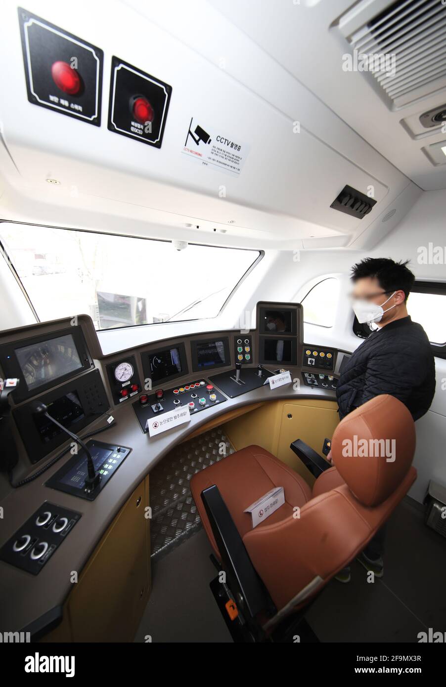 20th Apr, 2021. Trains for GTX-A A citizen looks around the cockpit of ...