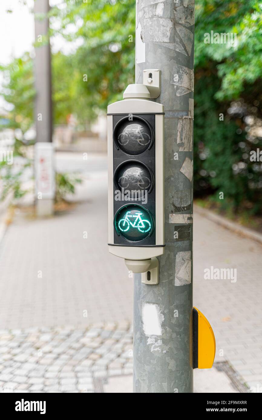 Traffic light for cyclists on a city road on a summer day Stock Photo ...