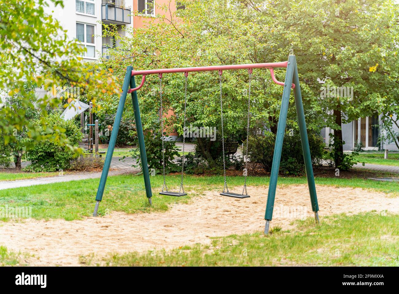 Modern colorful playground with slides, swings and other children's ...