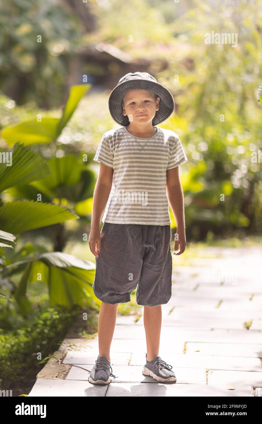 Outdoor portrait of a cute boy in hat Stock Photo - Alamy