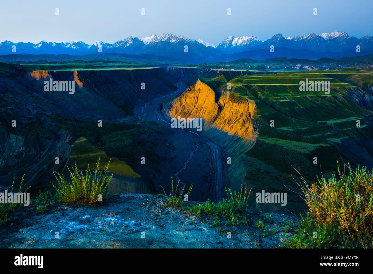 River in valley Stock Photo - Alamy