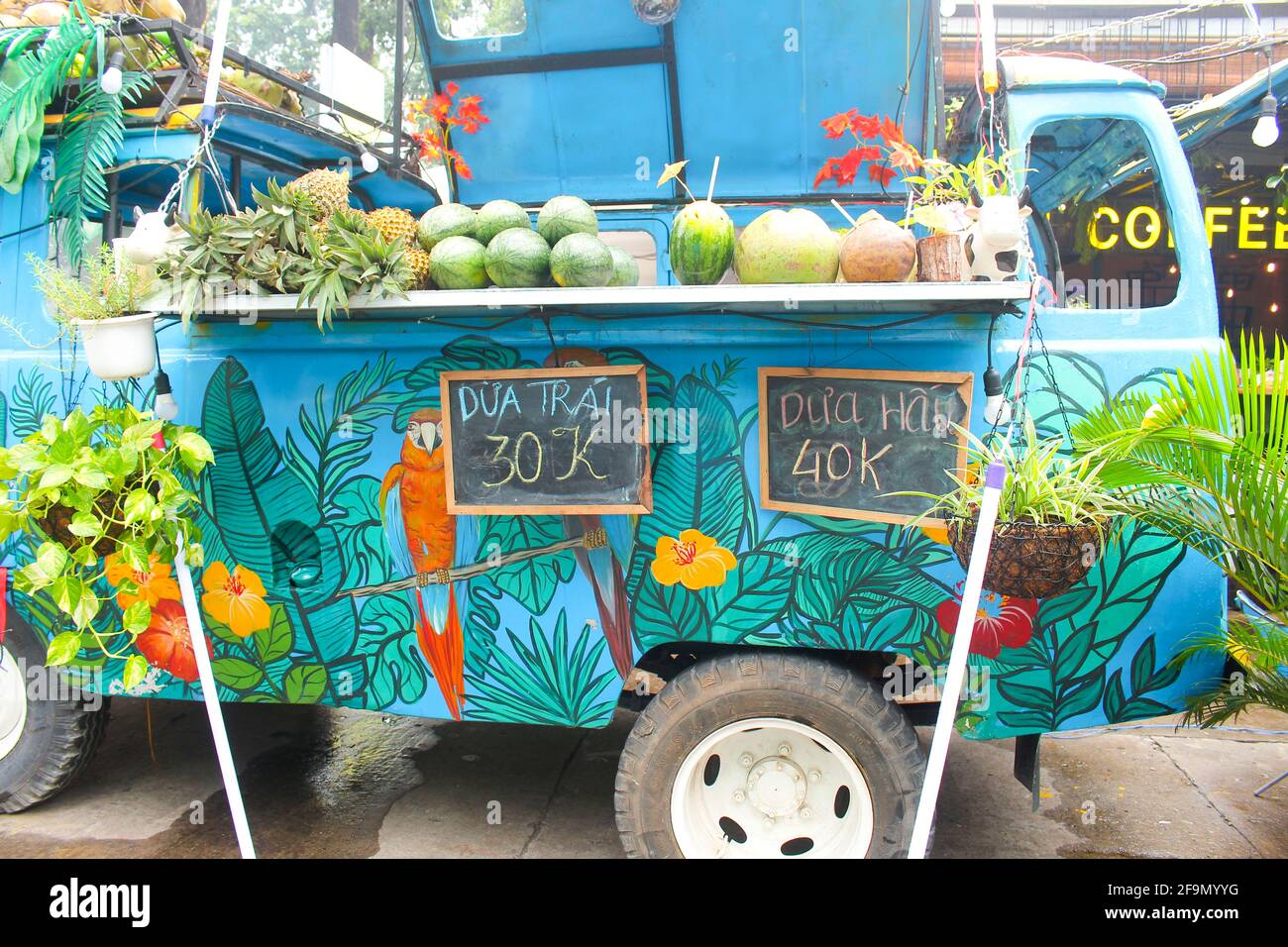 Pineapple and melon fruit car Stock Photo - Alamy