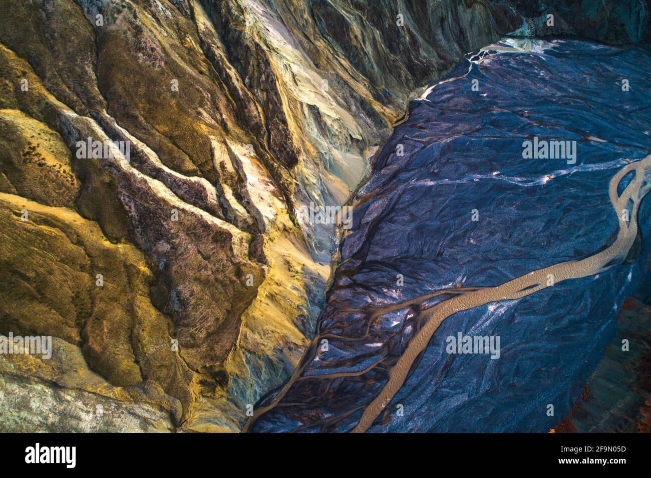 River in valley Stock Photo - Alamy