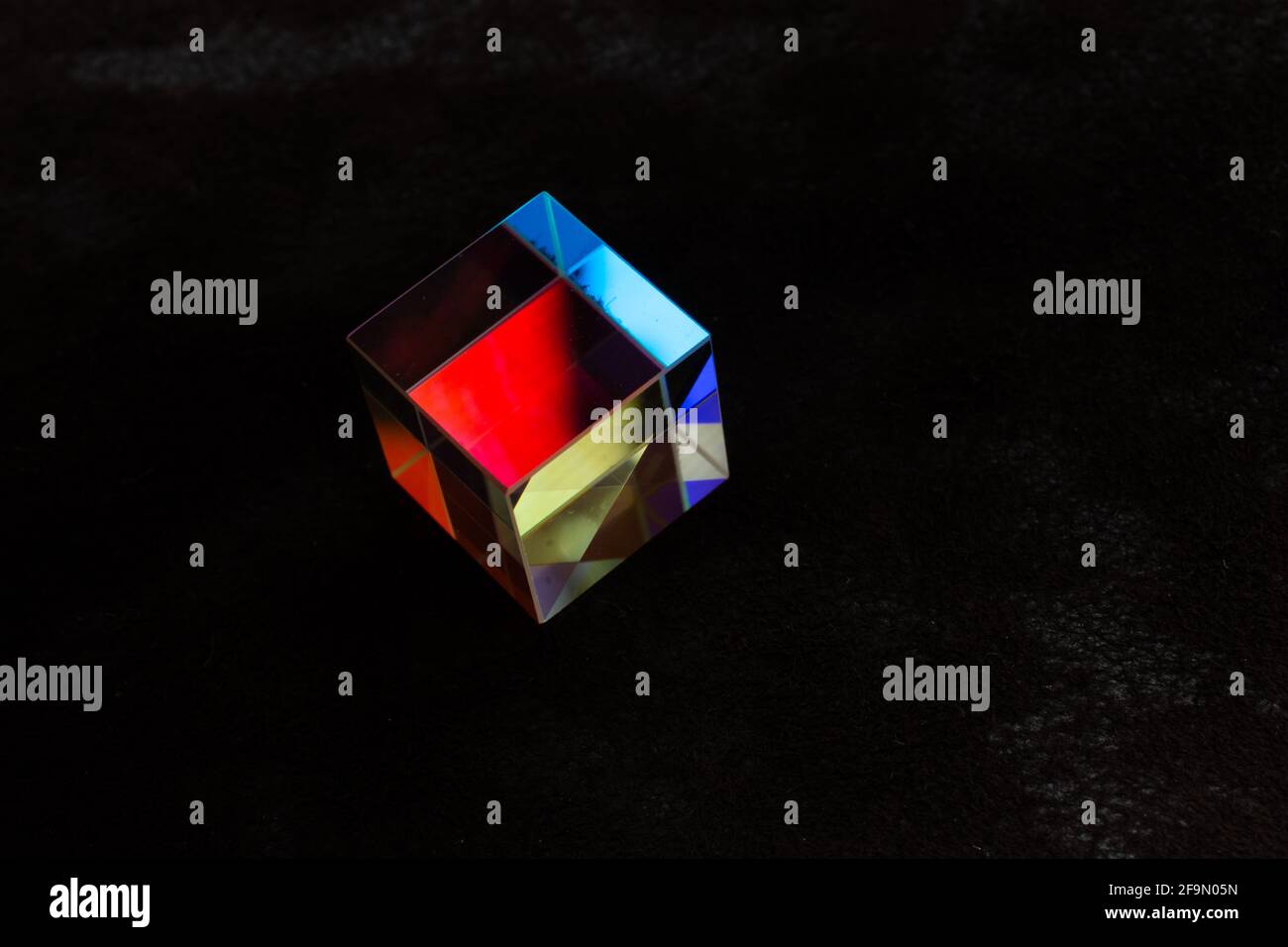 Optical glass cube Light dispersion,spectrum. Physics optics ray refractions Stock Photo - Alamy