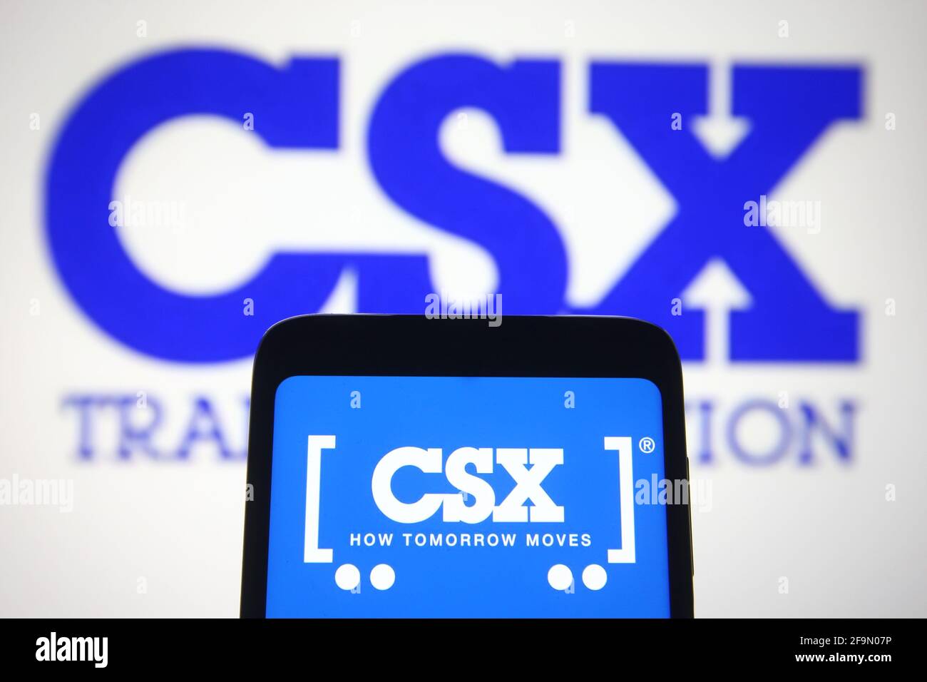 In this photo illustration a CSX Transportation logo of US railroad is ...