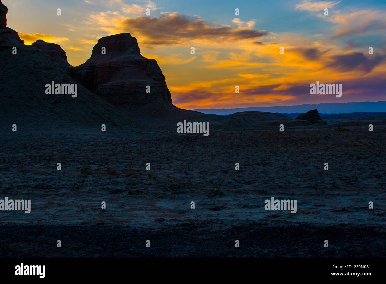 Sunset in desert Stock Photo - Alamy