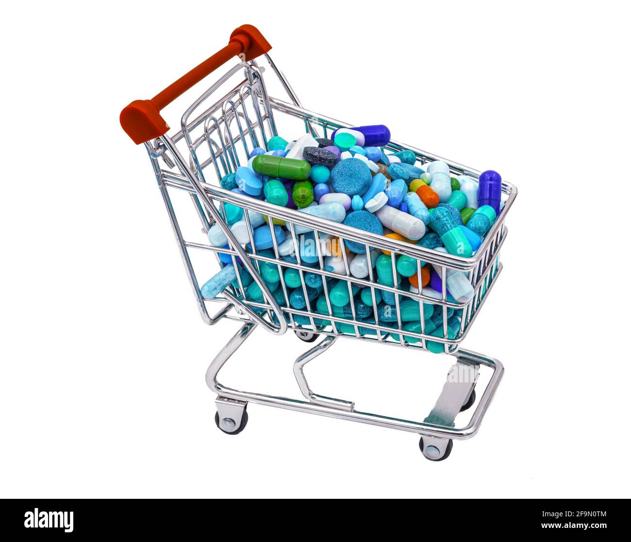 shopping cart full with blue pills and capsules Stock Photo - Alamy