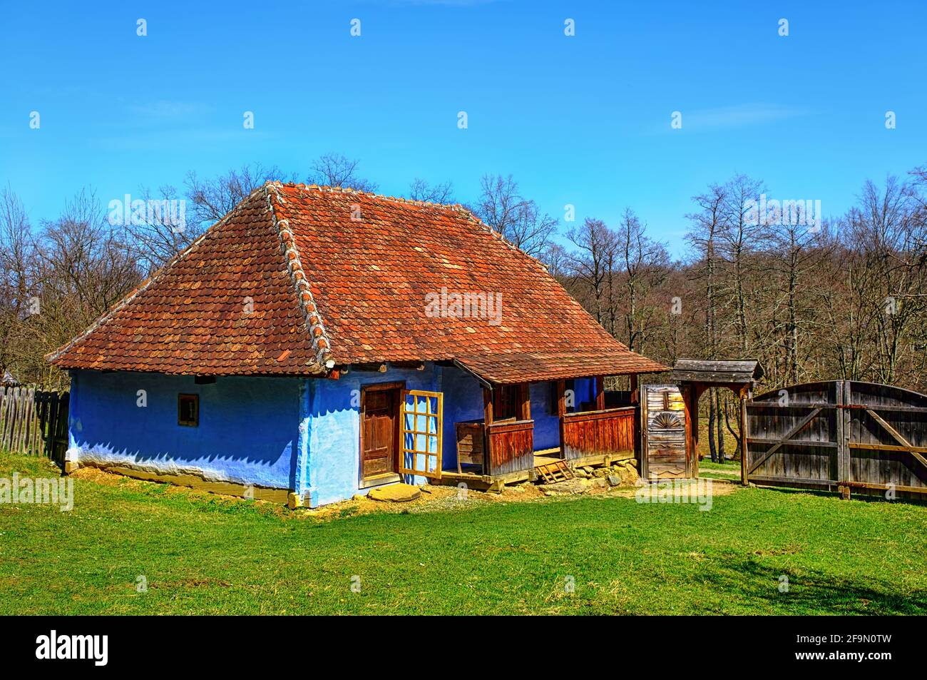 traditional Romanian clay house with grass yard, Transylvania, Sibiu ...