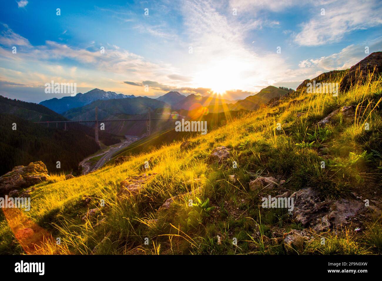 Sunrise on top of mountain Stock Photo - Alamy