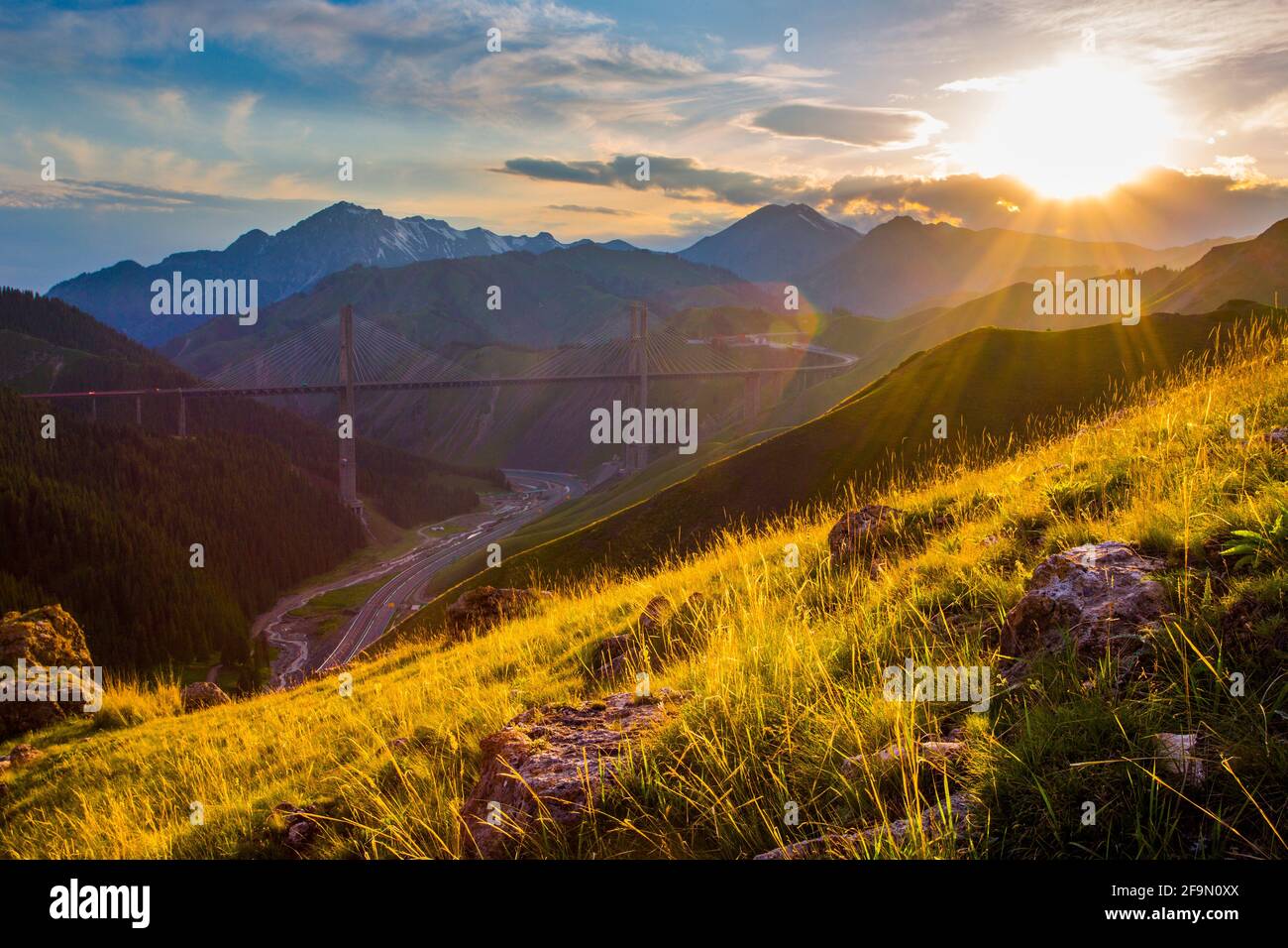 Sunrise on top of mountain Stock Photo - Alamy