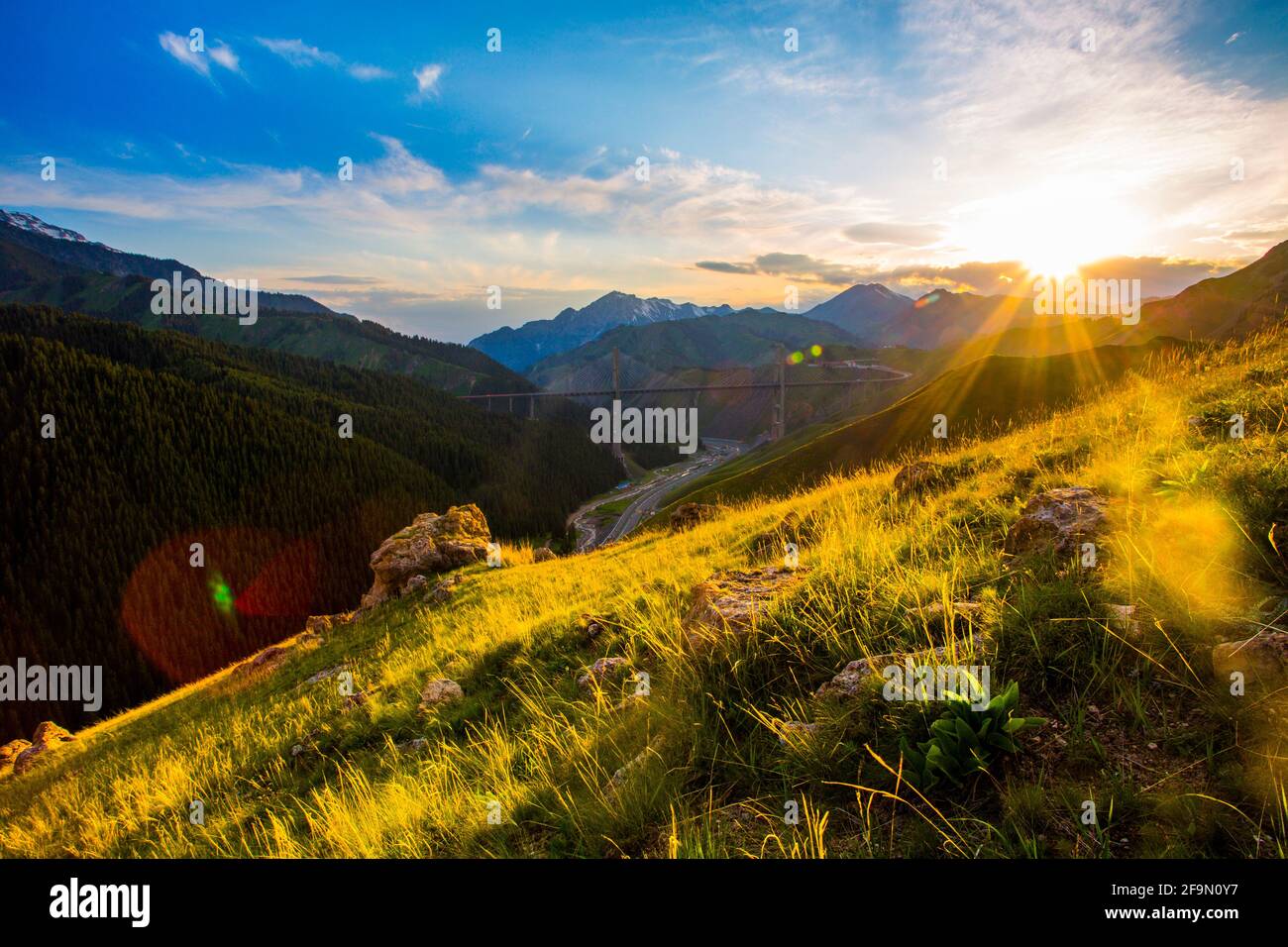 Sunrise on top of mountain Stock Photo - Alamy